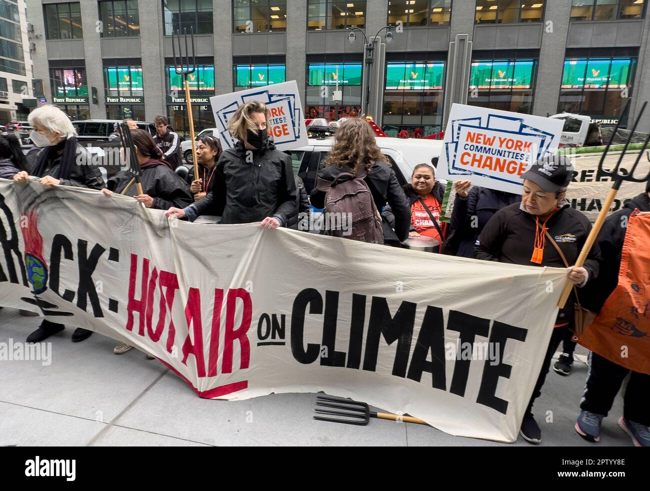 New York, USA. 28th Apr, 2023. Climate Change protestors throw black ...