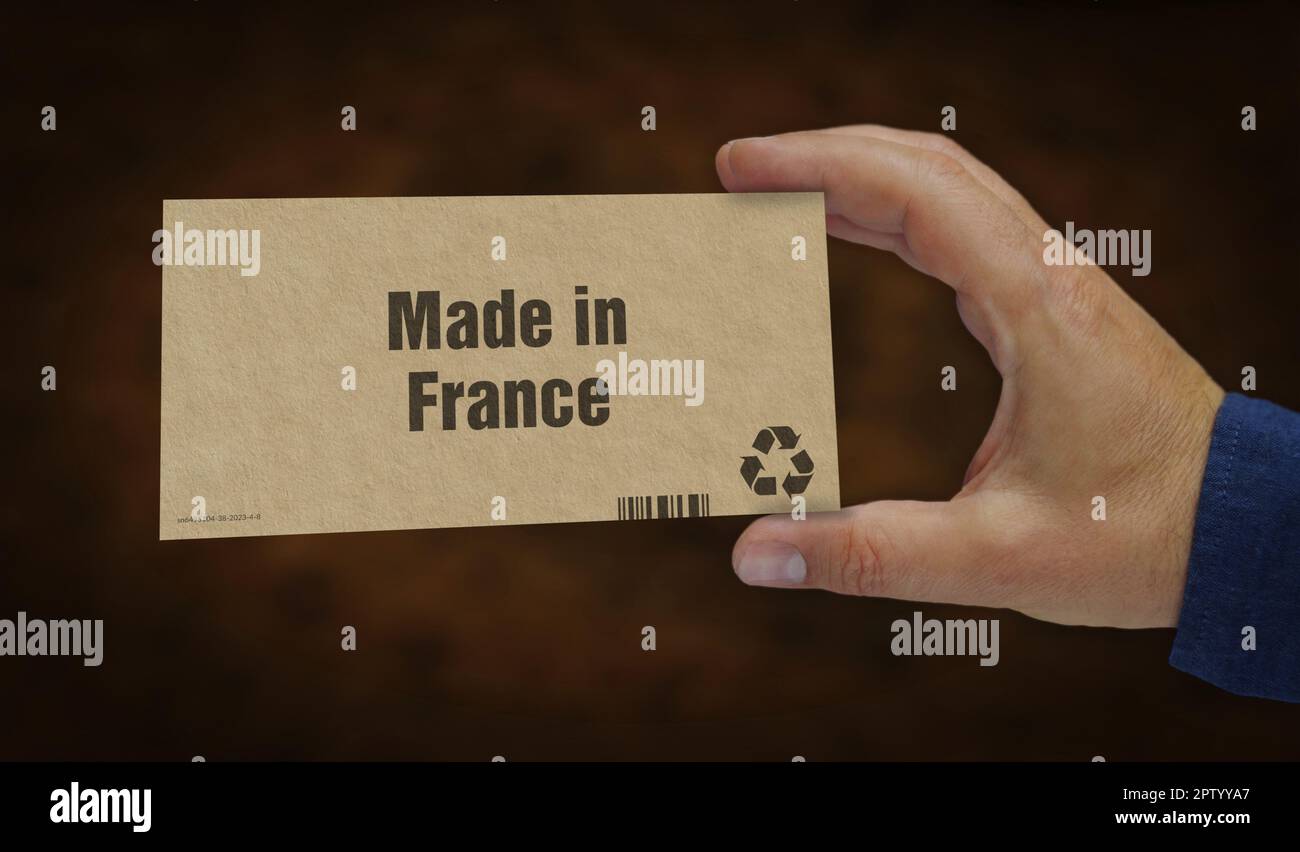 Made in France box in hand. Manufacturing and delivery. Product factory ...