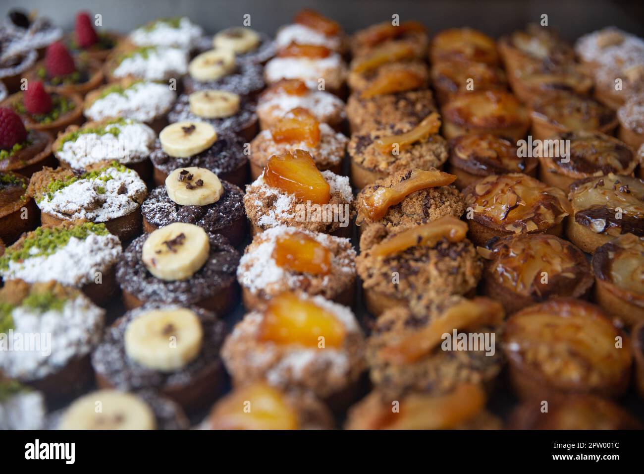 Various Fruits and Nuts Sweet Tarts at a bakery Stock Photo - Alamy