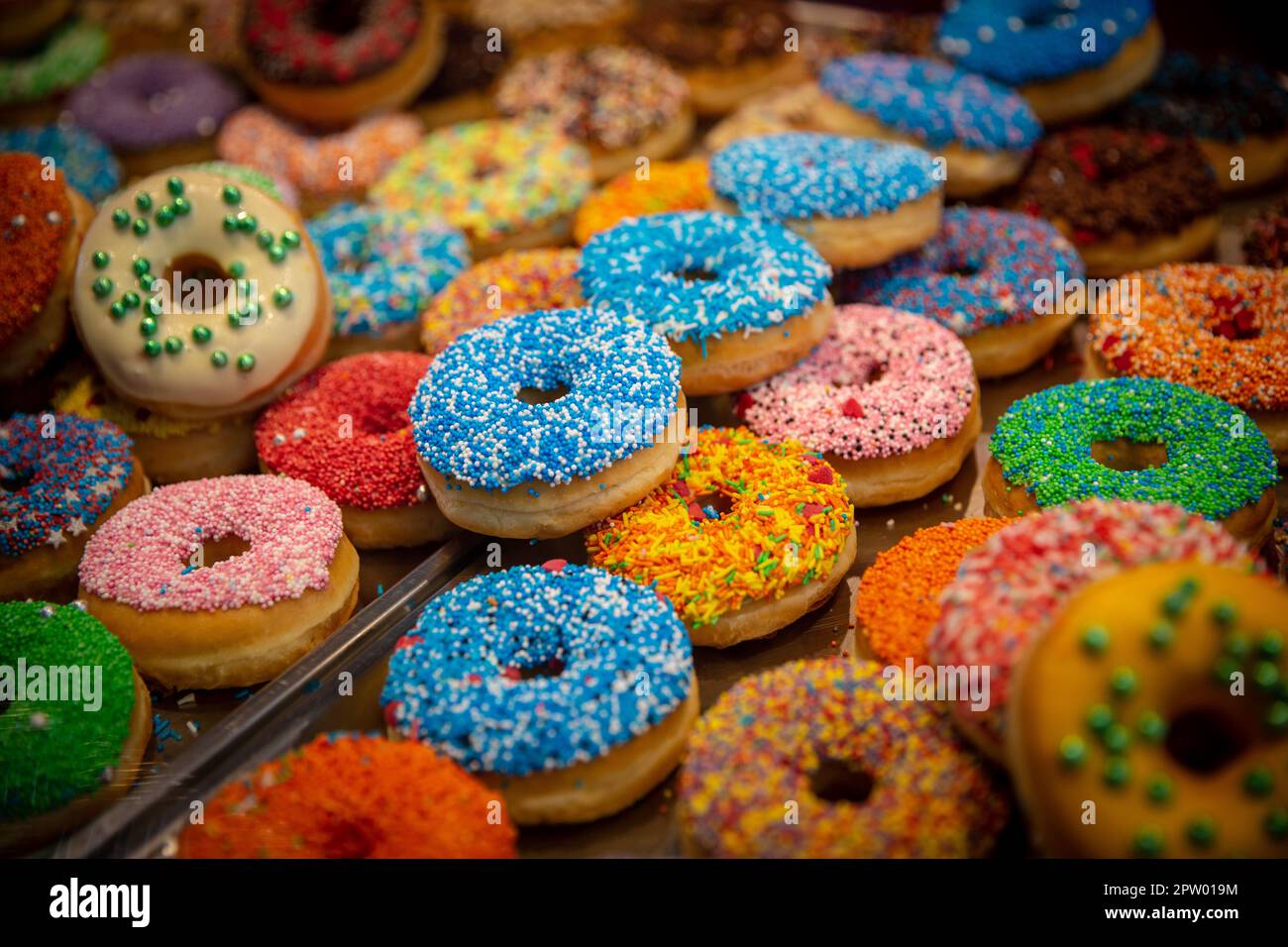 Freshly baked donuts sprinkles hi-res stock photography and images - Alamy