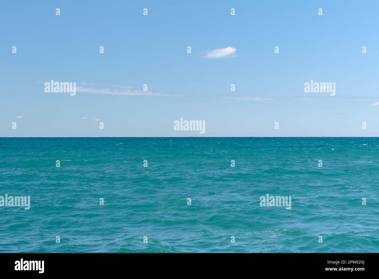 View of the calm sea at noon, clear sunny weather, idea for a ...