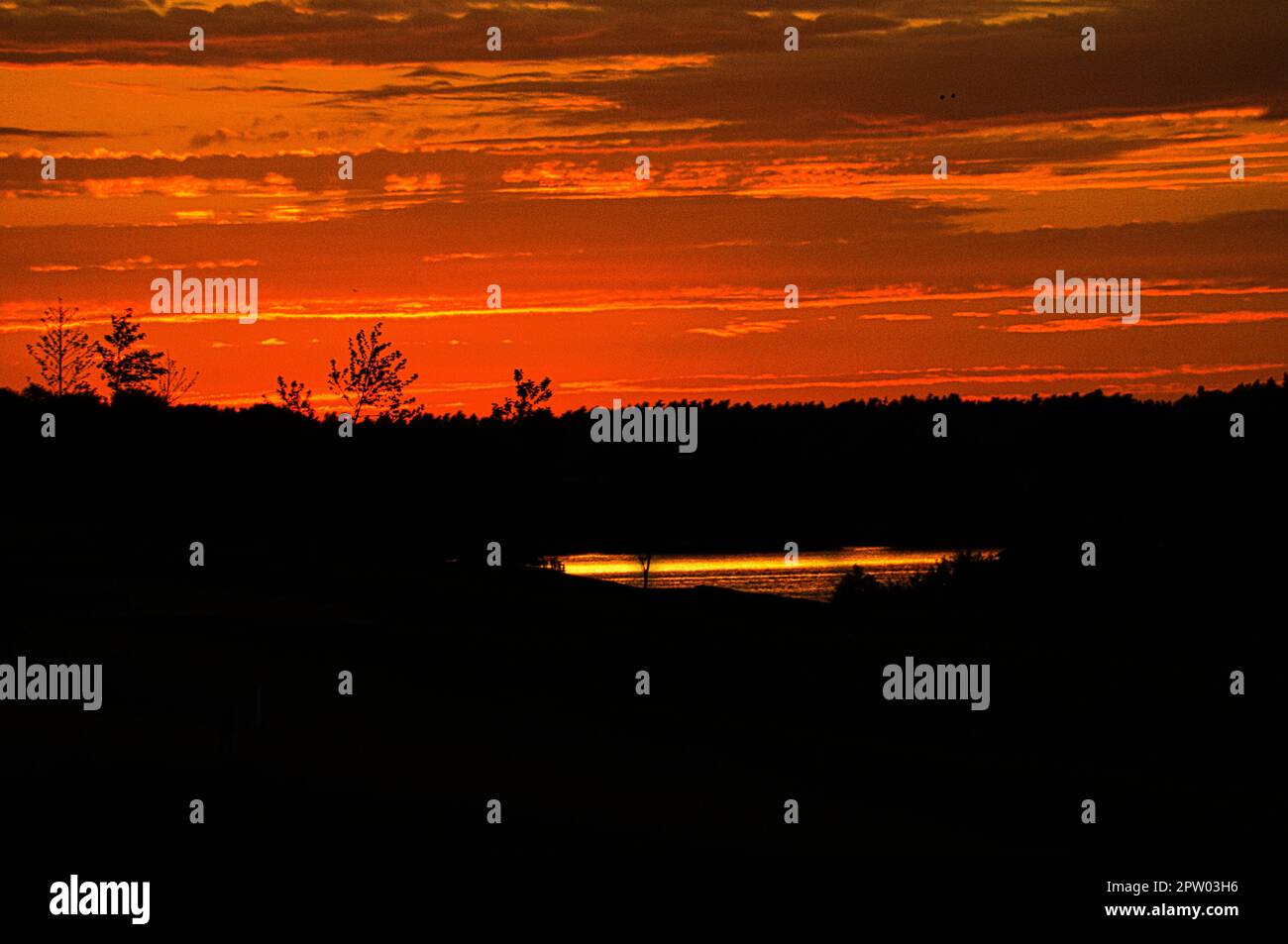 burning sky. Sunset with extreme colors. clouds and light atmosphere ...