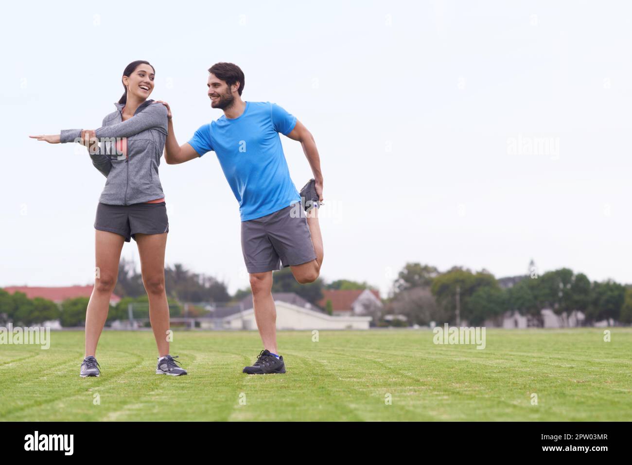 Helping each other stretch hi-res stock photography and images - Alamy