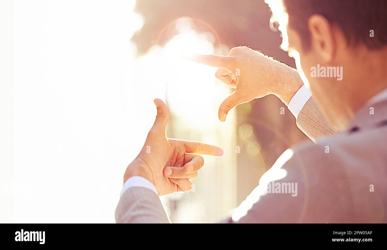 He sees the bigger picture. Over the shoulder shot of a businessman ...