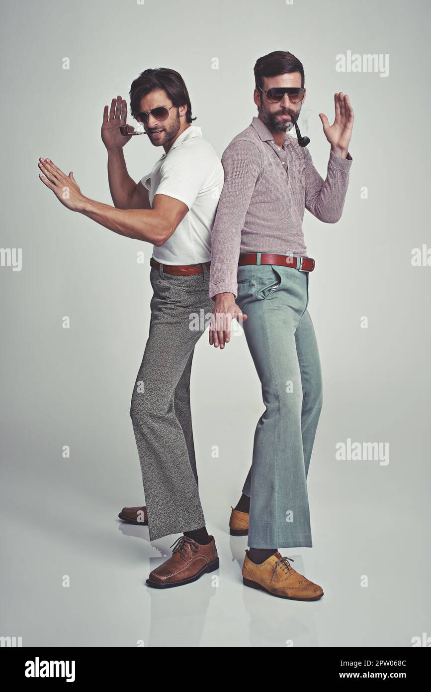 Stepped a bit too close... AAAAAAAAAND hes gone. Studio shot of two men ...