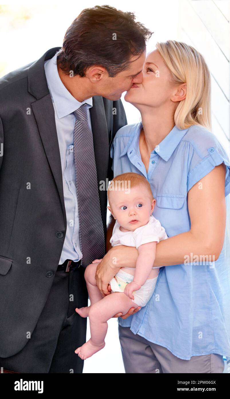 We are a loving family. Young parents showing love and affection ...