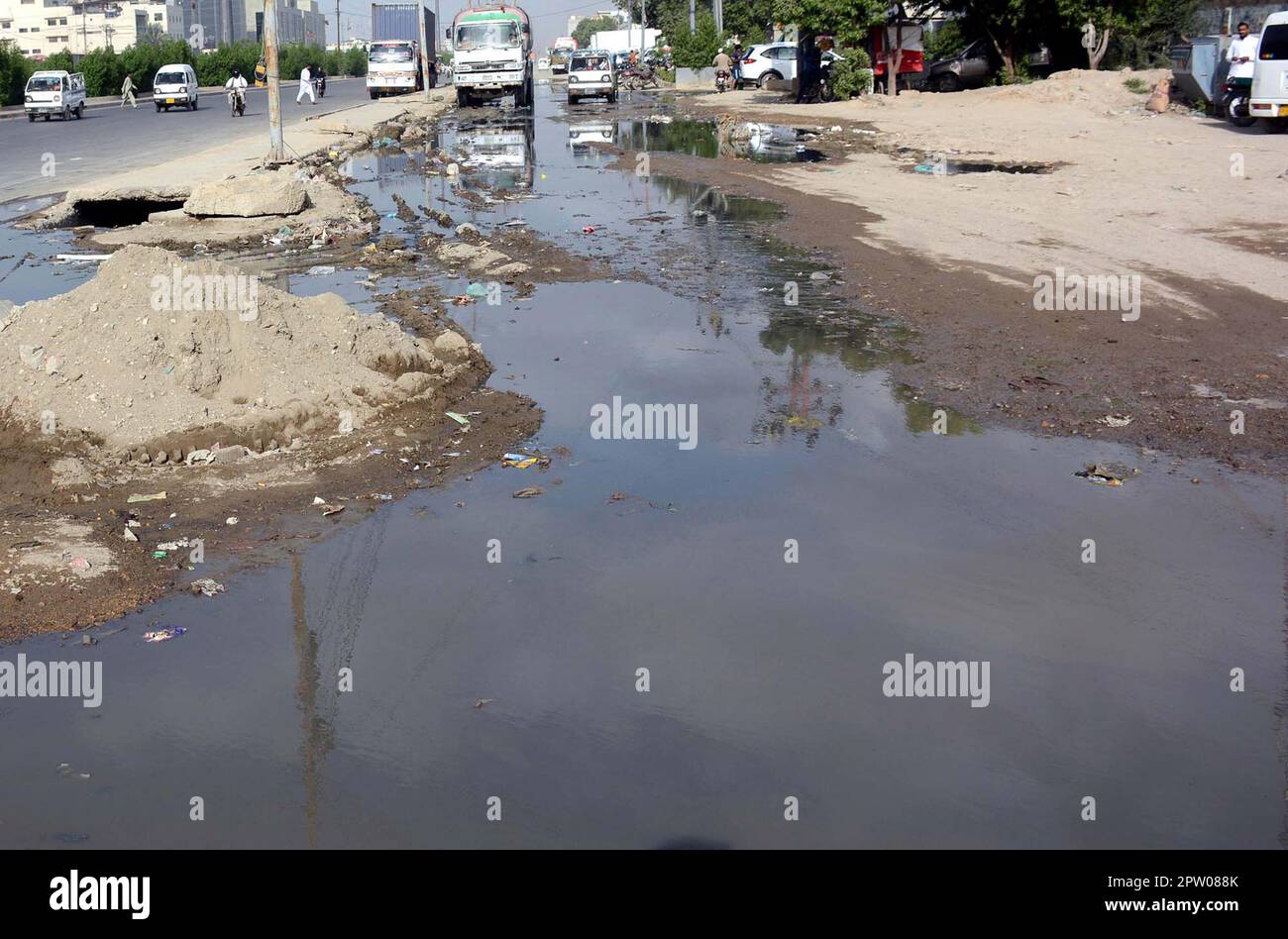 Inundated road by overflowing sewerage water, causing unhygienic ...