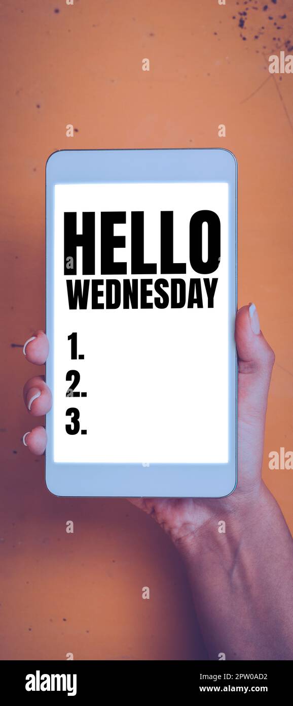Hand writing sign Hello Wednesday, Word Written on Hump day Middle of ...