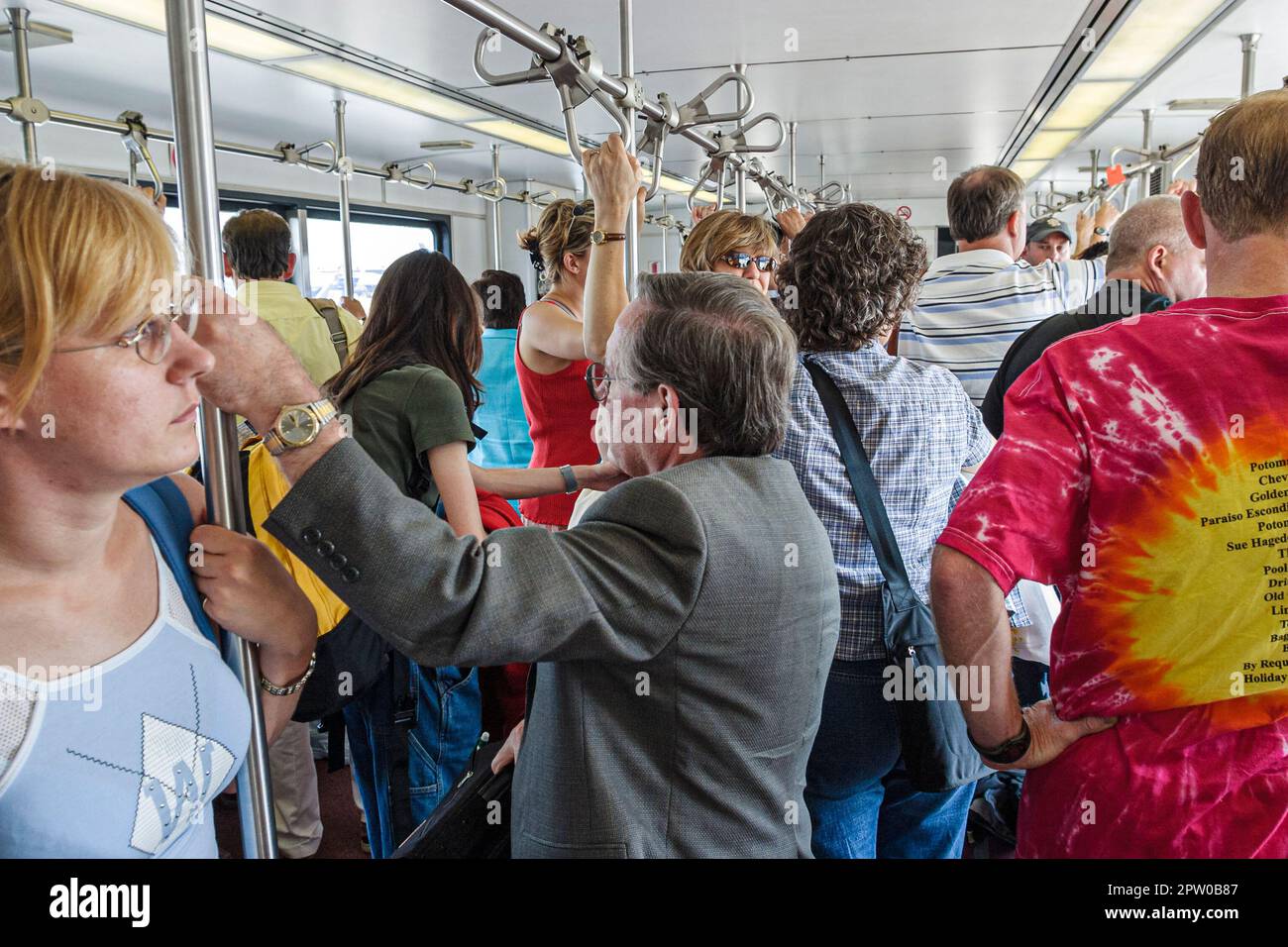 Onboard free shuttle people mover passengers standing transportation ...
