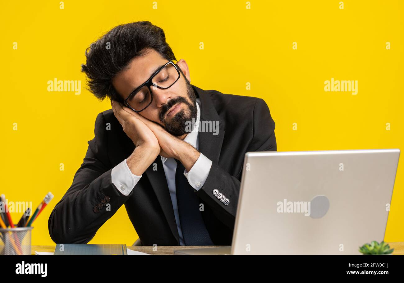 Indian man yawning leaning hi-res stock photography and images - Alamy