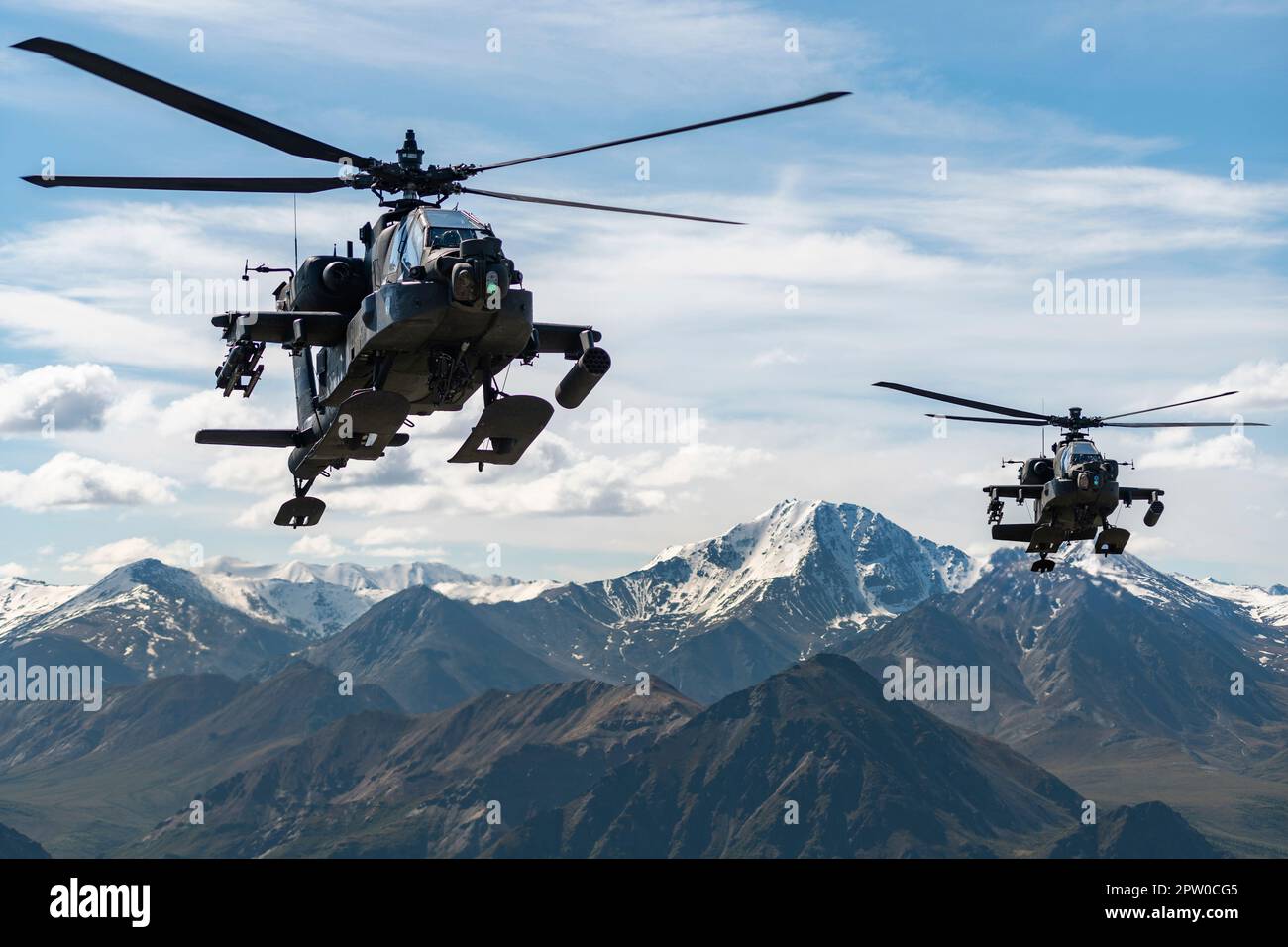 In this photo released by the U.S. Army, AH-64D Apache Longbow attack ...