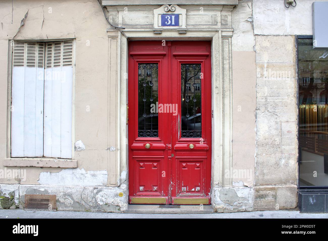 View of a colourful red doorway here located on the Boulevard Richard ...