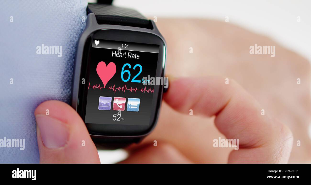 Smart Watch Showing Heartbeat Monitor On Man's Hand Stock Photo - Alamy