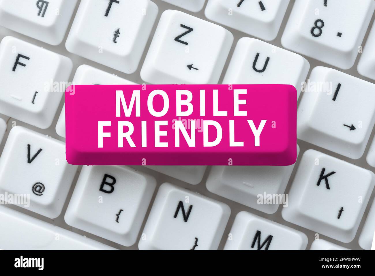 Hand writing sign Mobile Friendly, Word for website is designed to ...