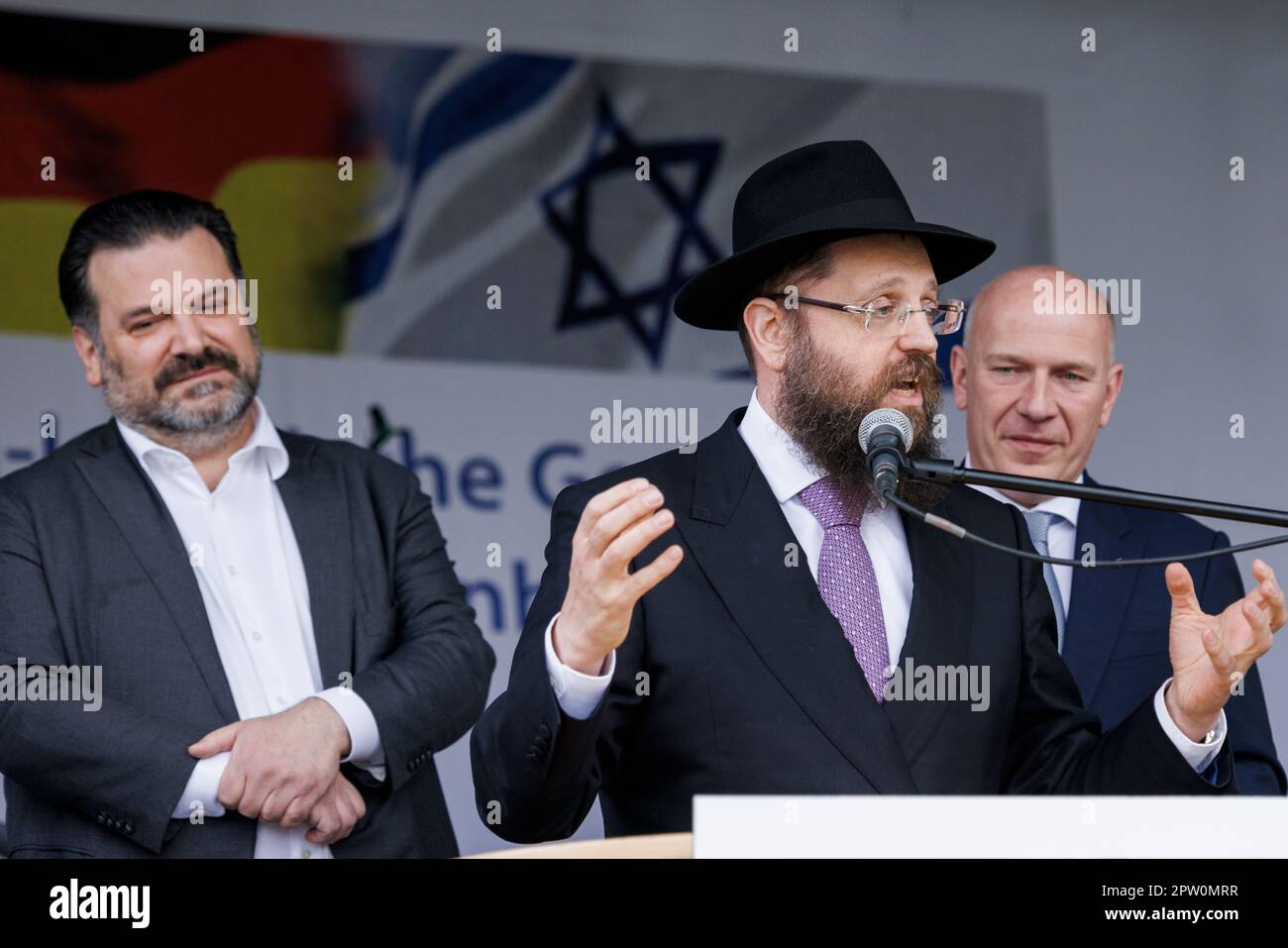 Berlin, Germany. 28th Apr, 2023. Rabbi Yehuda Teichtal (M), speaks in ...