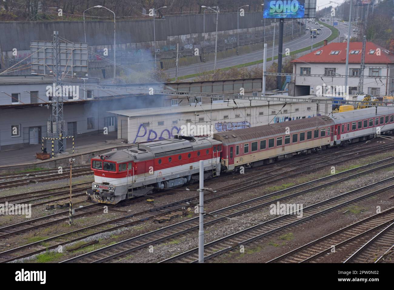 Slovakian Railways diesel locomotive pulling a train arriving at Hlavná ...