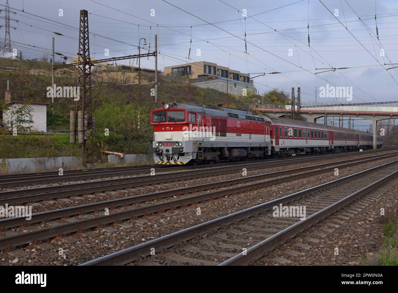Slovakian Railways diesel locomotive pulling a train into the city of ...