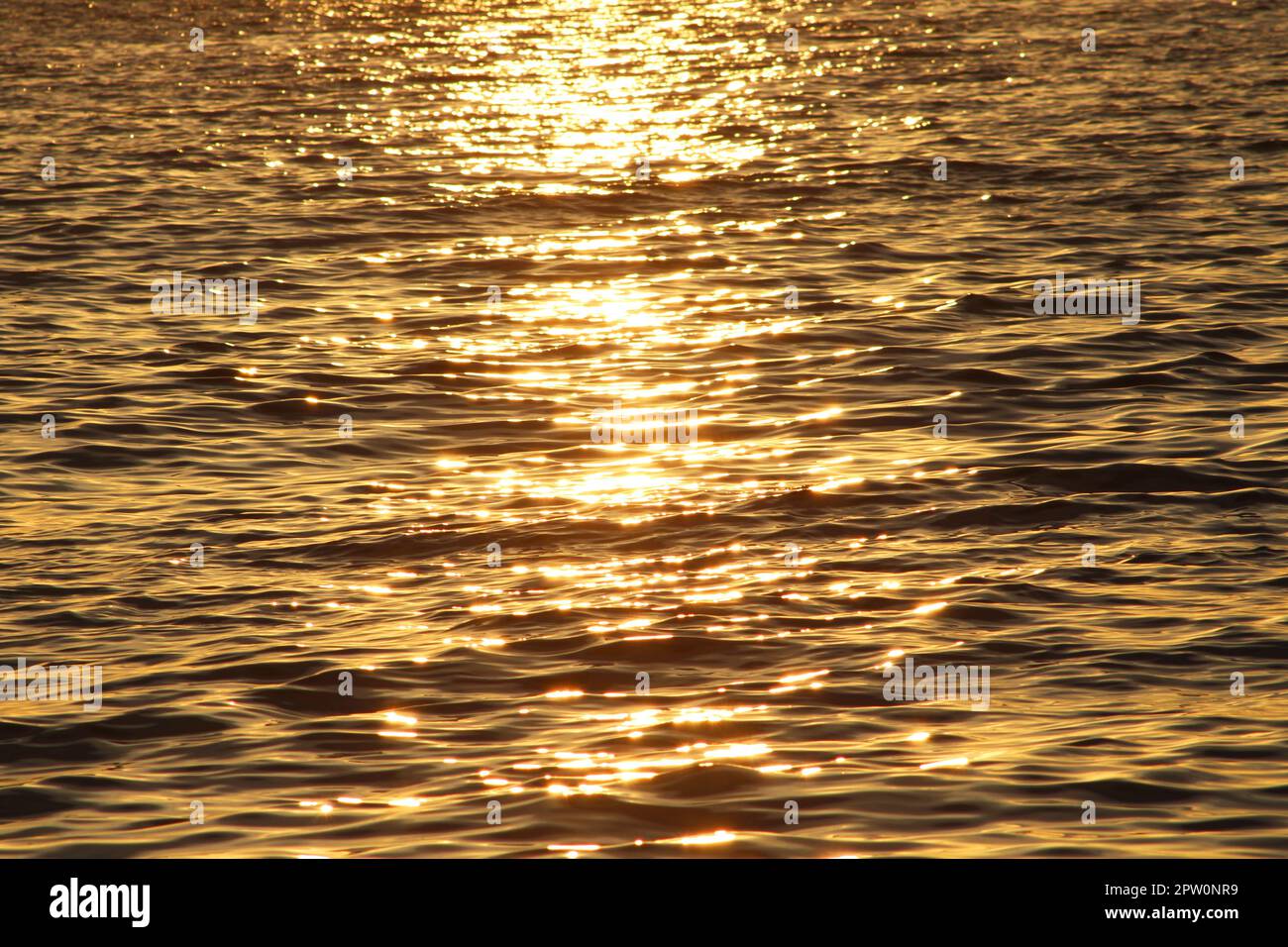 Golden sunset on sea bright colorful orange, yellow line of last ...