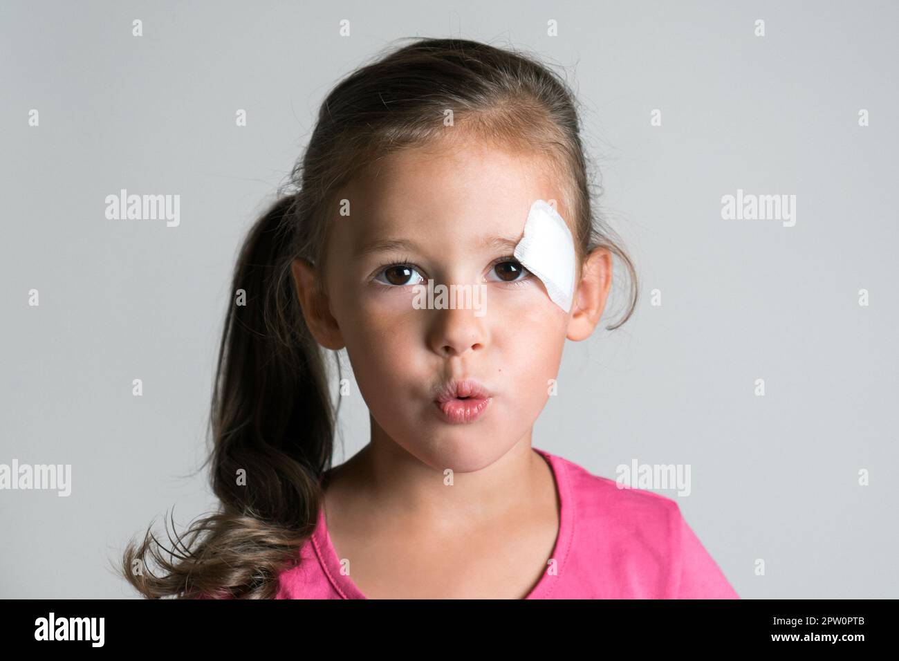 Close up cute, sad, disappointed dark haired little kid, girl with ...