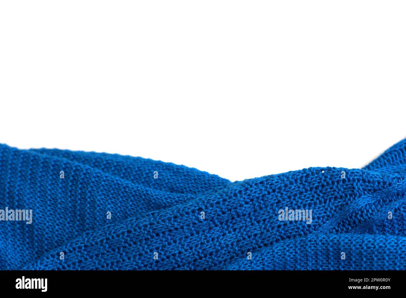 Azure blue crochet sweater on white background. Texture detail close up ...