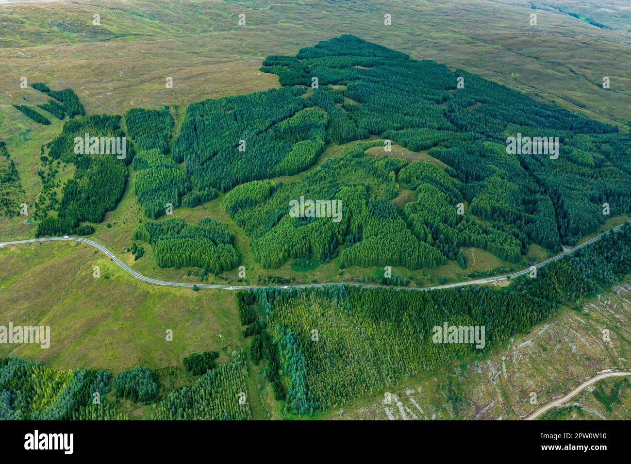 Aerial view of winding road in Scotland. Beautiful and clean nature ...