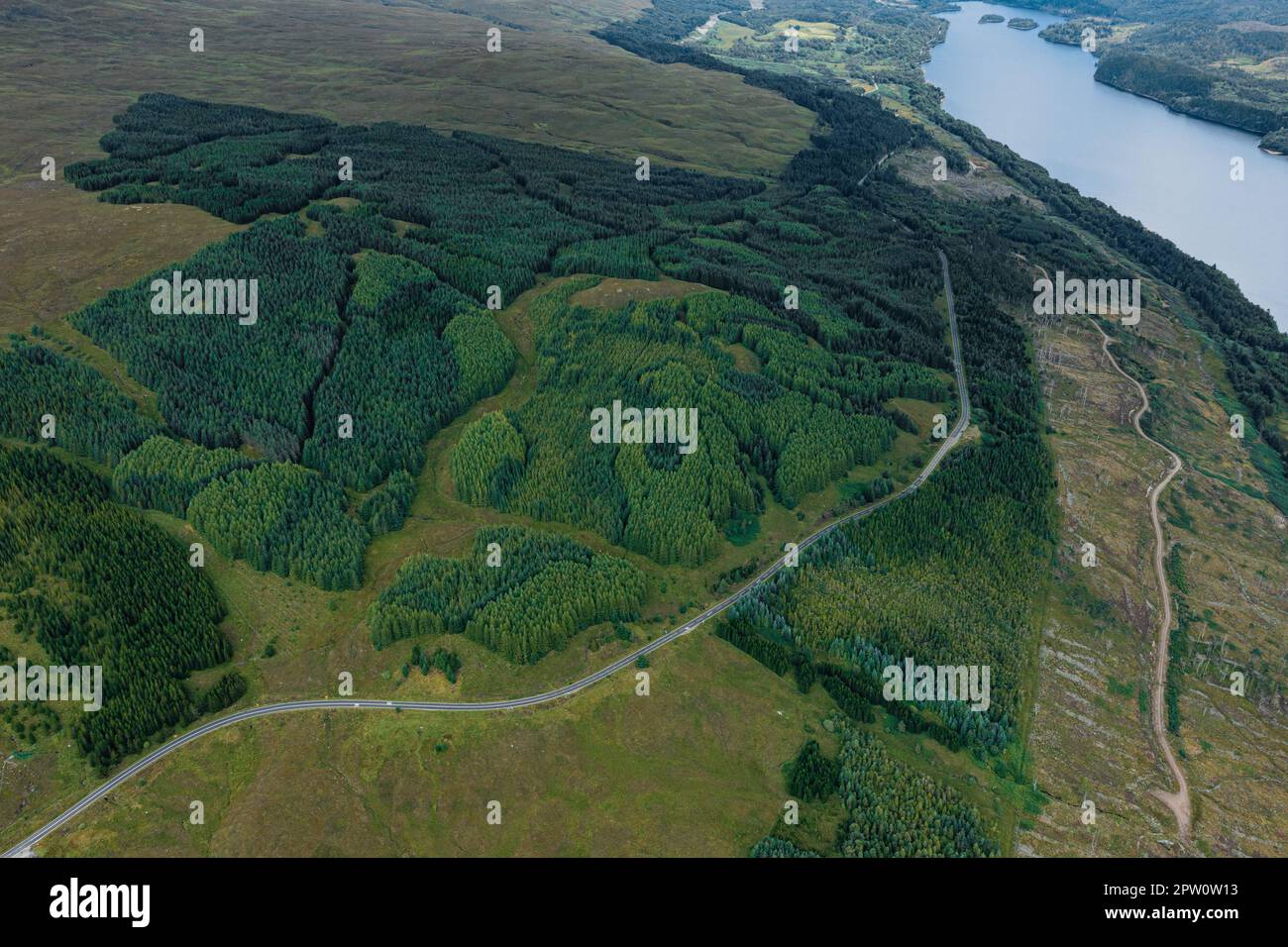 Aerial view of winding road in Scotland. Beautiful and clean nature ...
