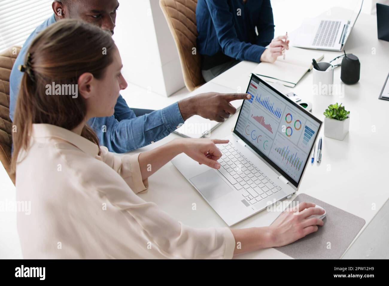 Financial Advisor Group Meeting Examining Analytics Dashboard Stock ...