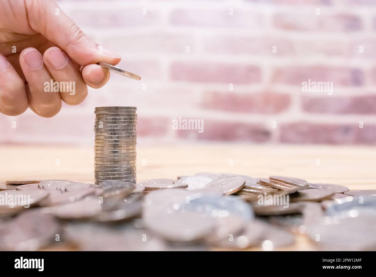 Images of growing stacking coins and Hand holding coin for planning ...