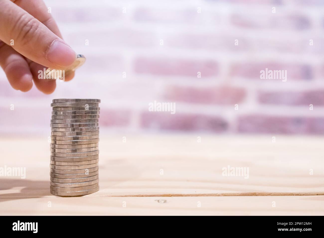 Images of growing stacking coins and Hand holding coin for planning ...