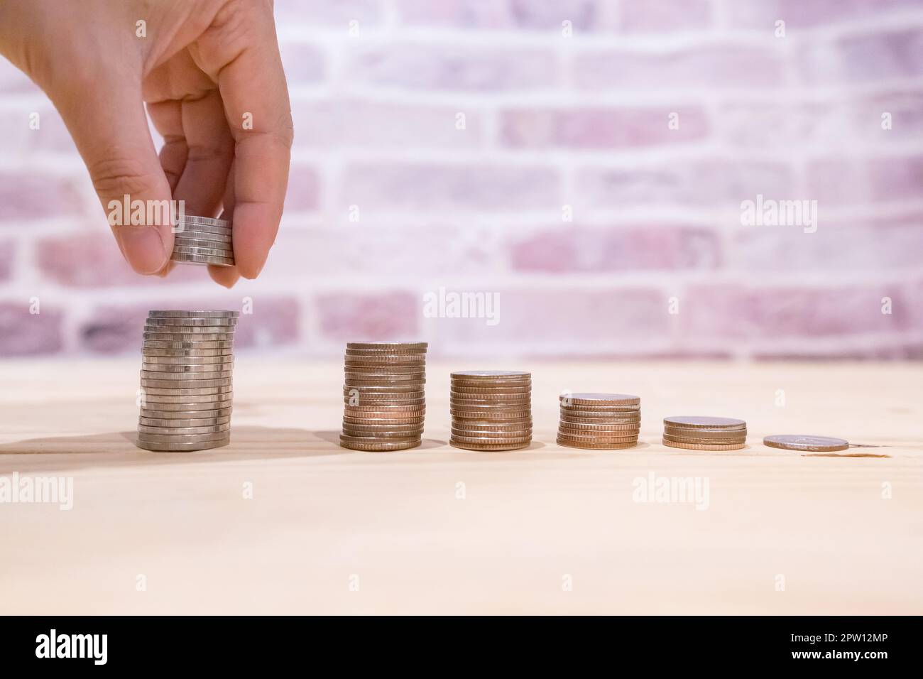 Images of growing stacking coins and Hand holding coin for planning ...