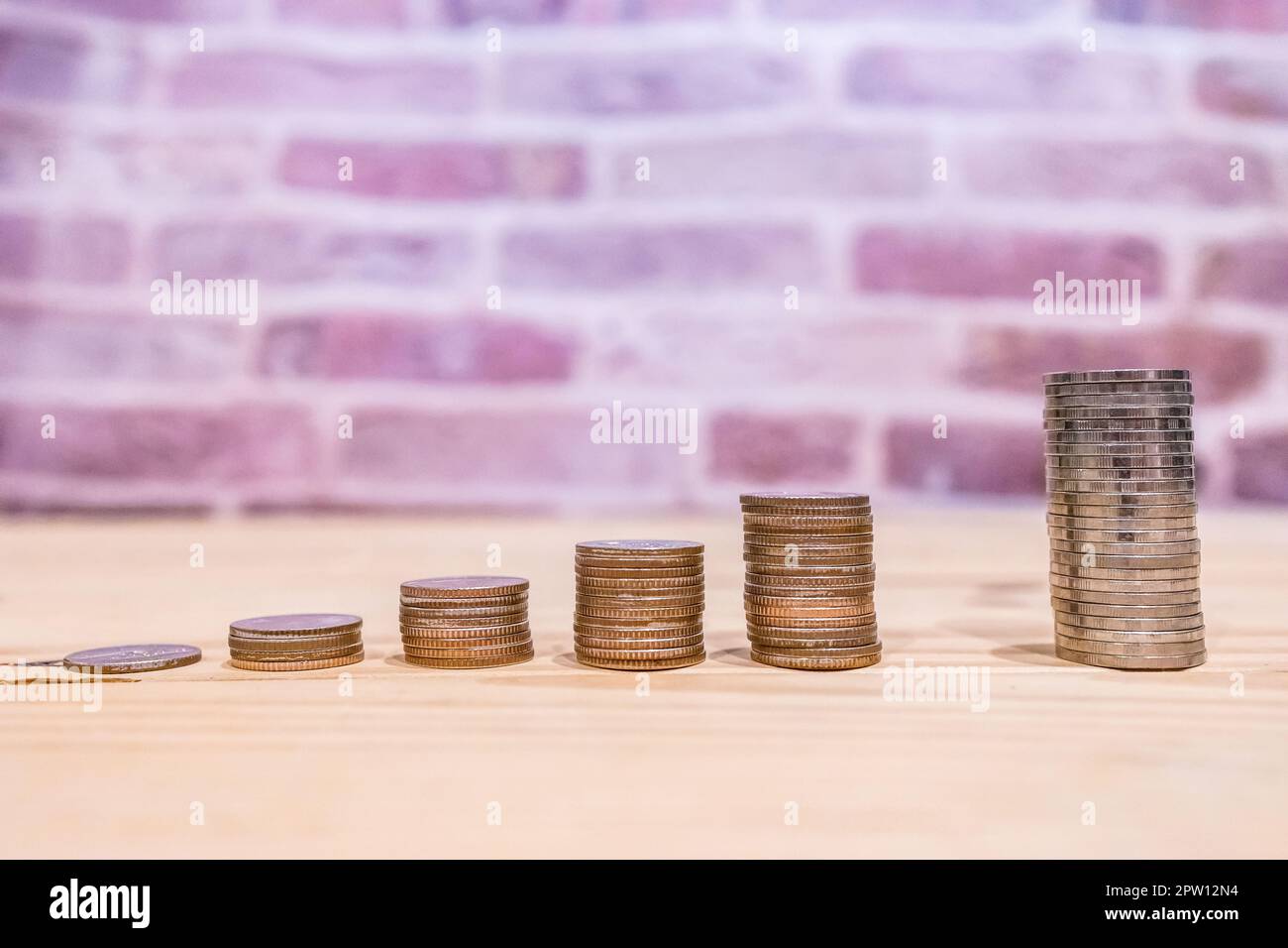 Images of growing stacking coins and Hand holding coin for planning ...