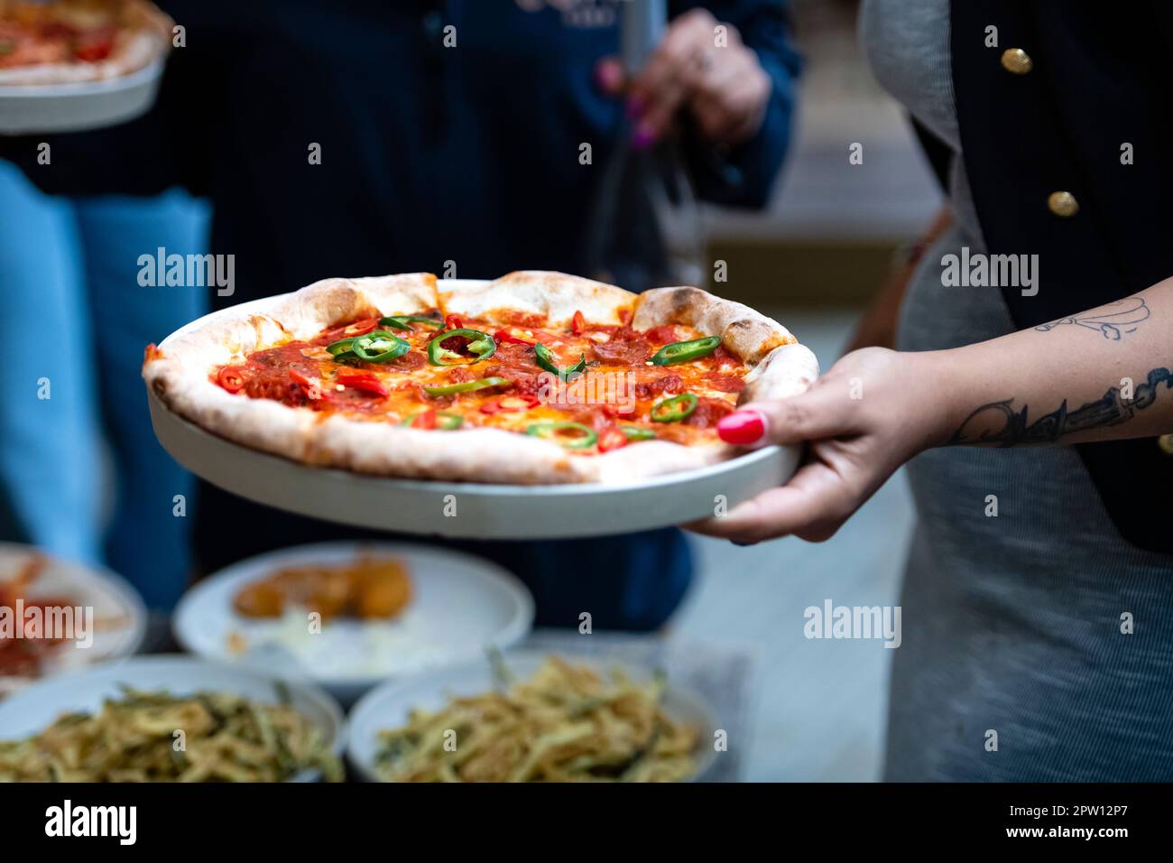 Lady holding the plate hi-res stock photography and images - Alamy