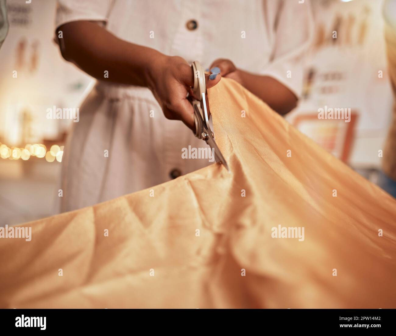 Fashion designer, fabric and scissors for cutting during production ...