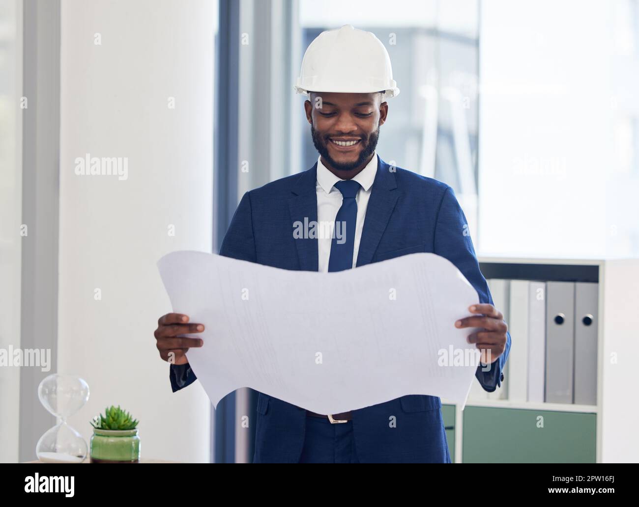 Man thinking how design of building hi-res stock photography and images ...