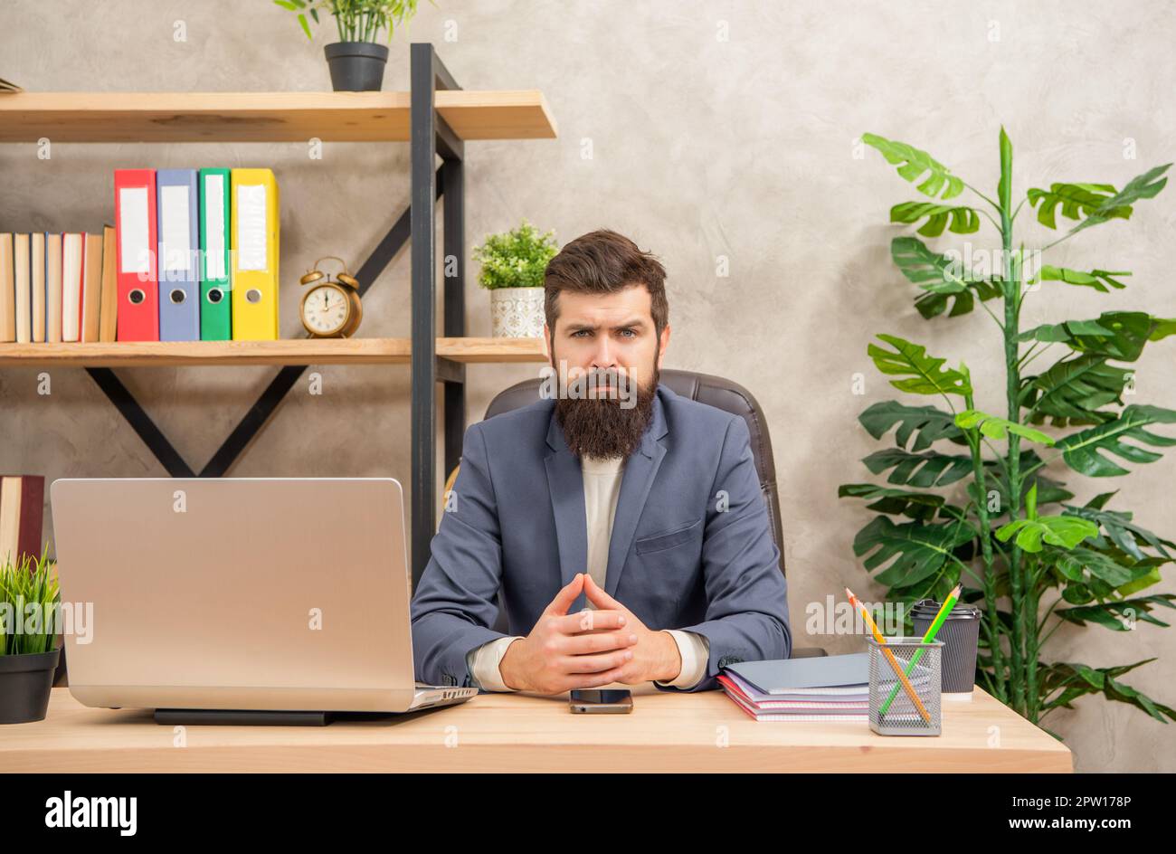 Serious businessman. Businessman at workplace. Man of business ...