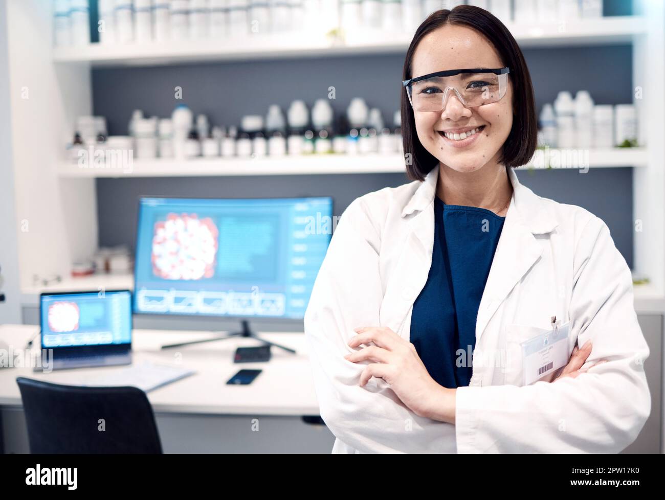 Portrait, laboratory and Asian woman crossed arms, research and ...