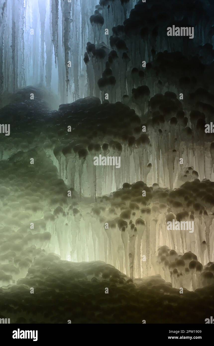 Huge ice icicles. Fragment of large blocks of ice frozen waterfall of ...