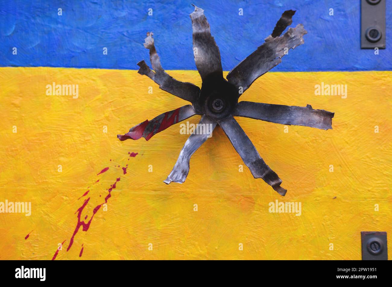 Shell fragment, Symbol of war in Ukraine Stock Photo - Alamy