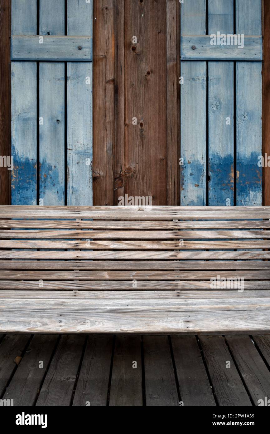 Front porch swing blue window shutters Stock Photo - Alamy