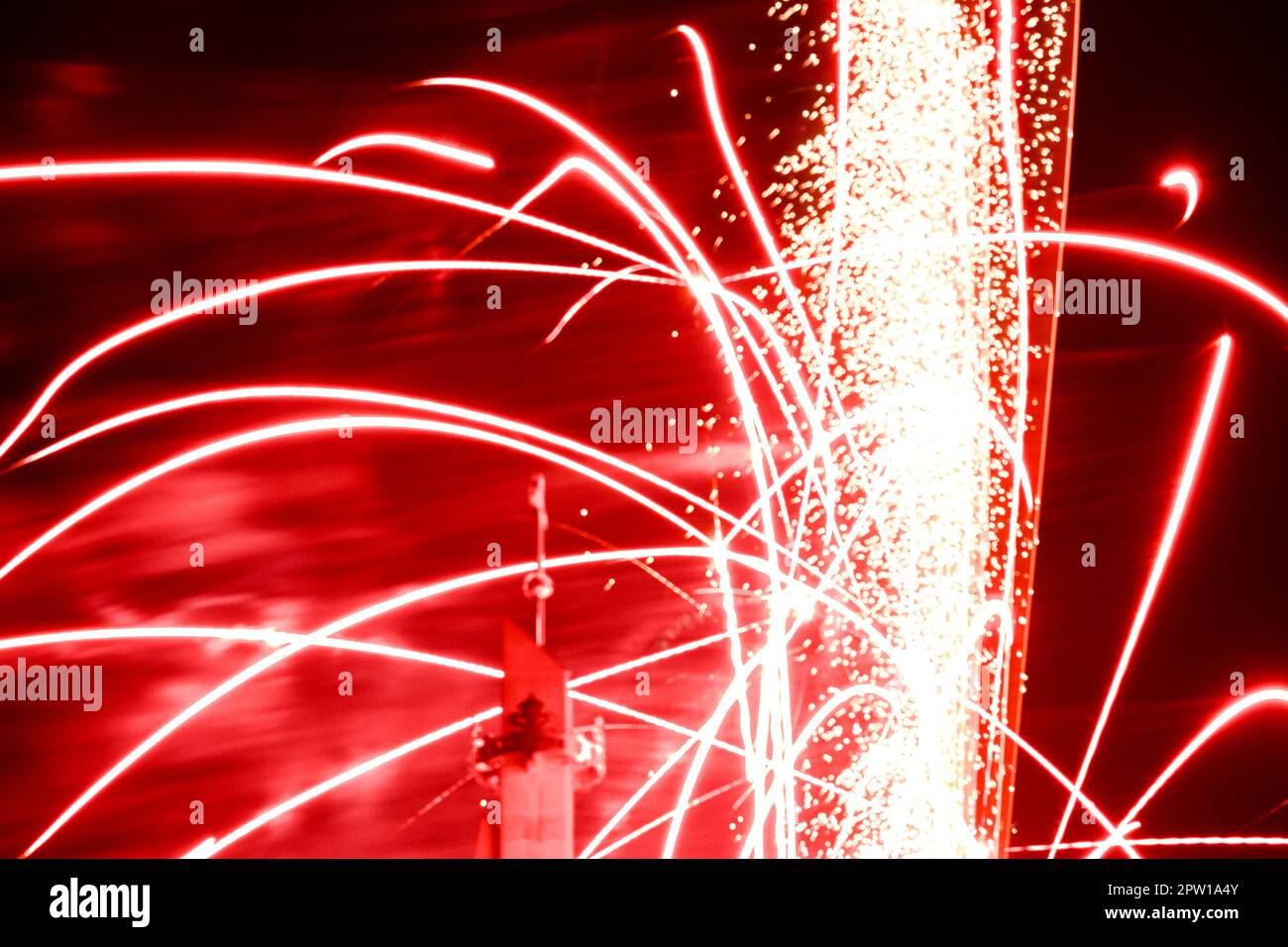 Firework. On background is tower of modern christian church Stock Photo ...