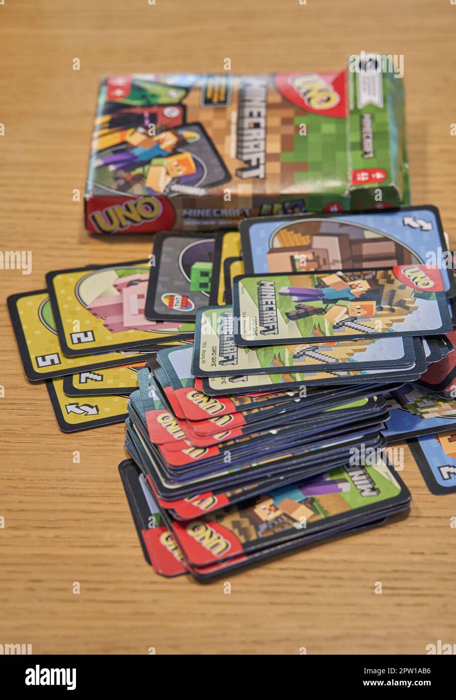 Uno Minecraft game cards on wooden surface Stock Photo - Alamy