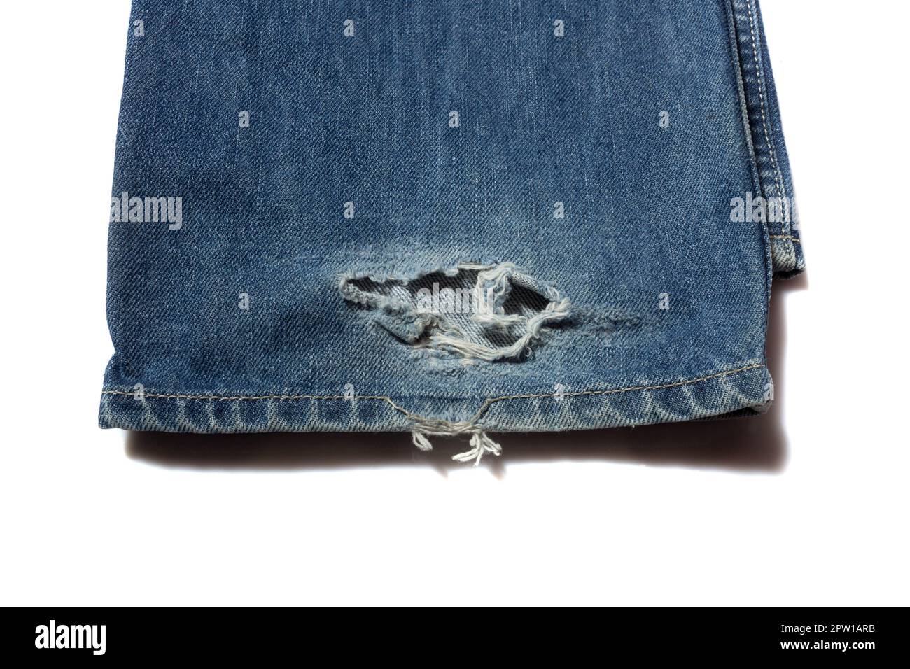 Broken blue jeans hi-res stock photography and images - Alamy