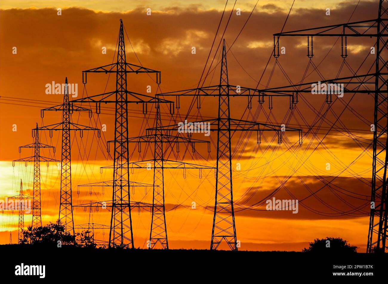Colorful sunset power lines silhouetted hi-res stock photography and ...