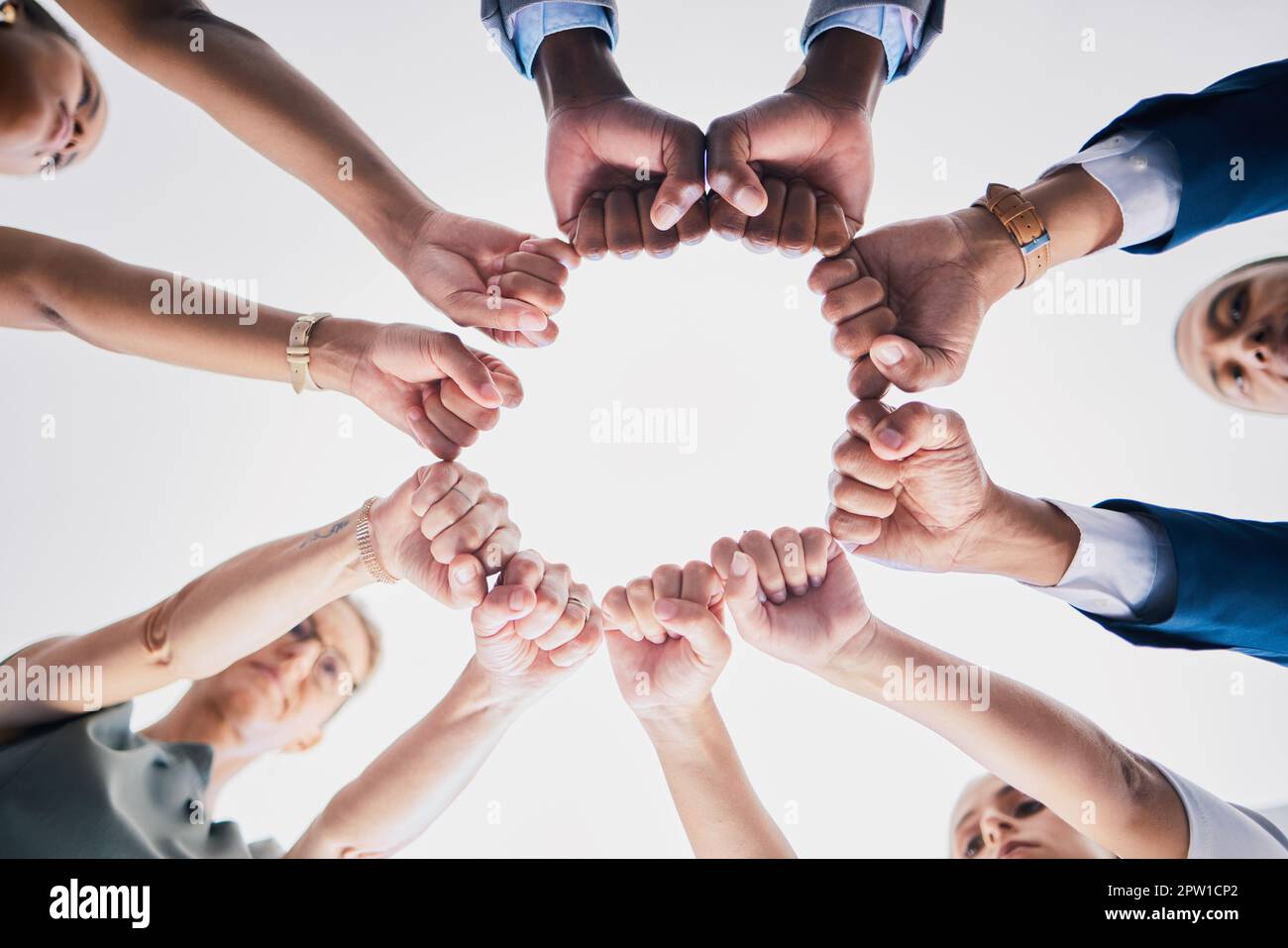 Group of business people, team building hands or fists in a circle in ...