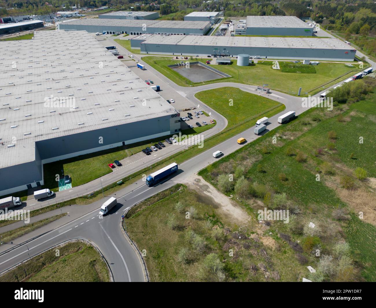 Aerial view of the logistics park with warehouse, loading hub and many ...