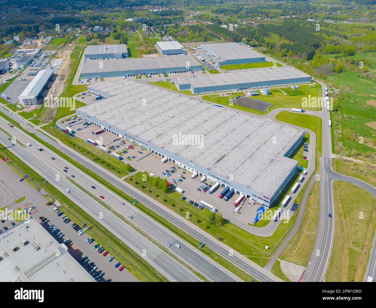 Aerial view of the logistics park with warehouse, loading hub and many ...