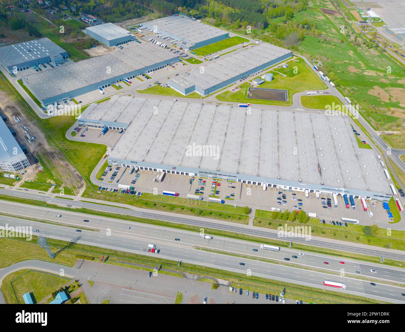Aerial view of the logistics park with warehouse, loading hub and many ...
