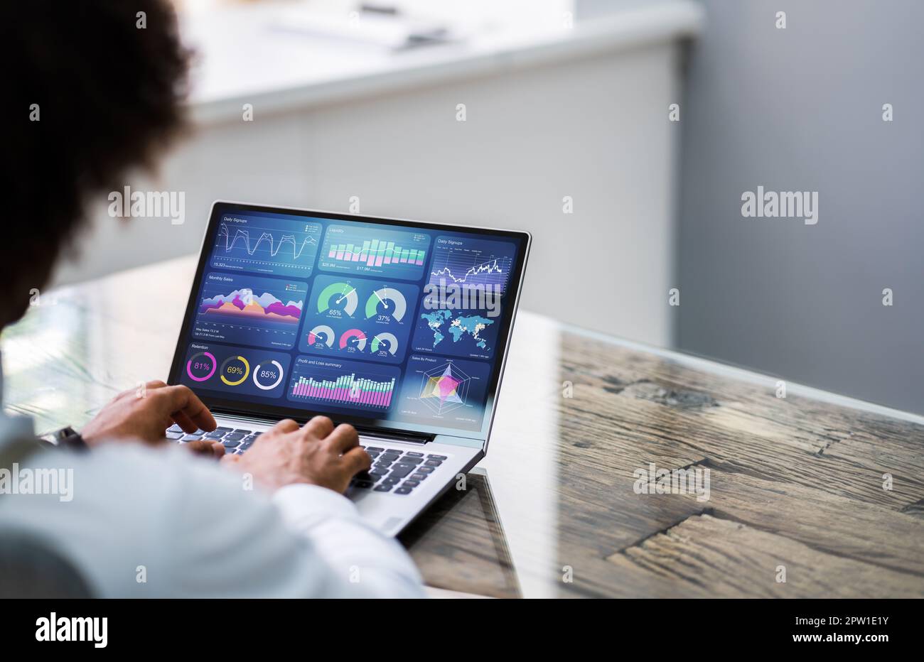 African American Data Analyst Using Data Analytics KPI Dashboard Stock ...