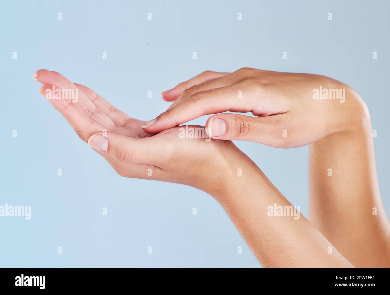 Closeup of female hands touching her palm. One woman with soft ...