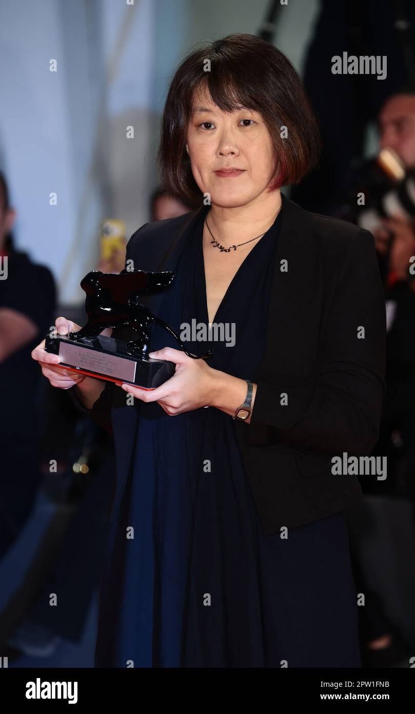 VENICE, ITALY - SEPTEMBER 10: Singing Chen poses with the Venice ...